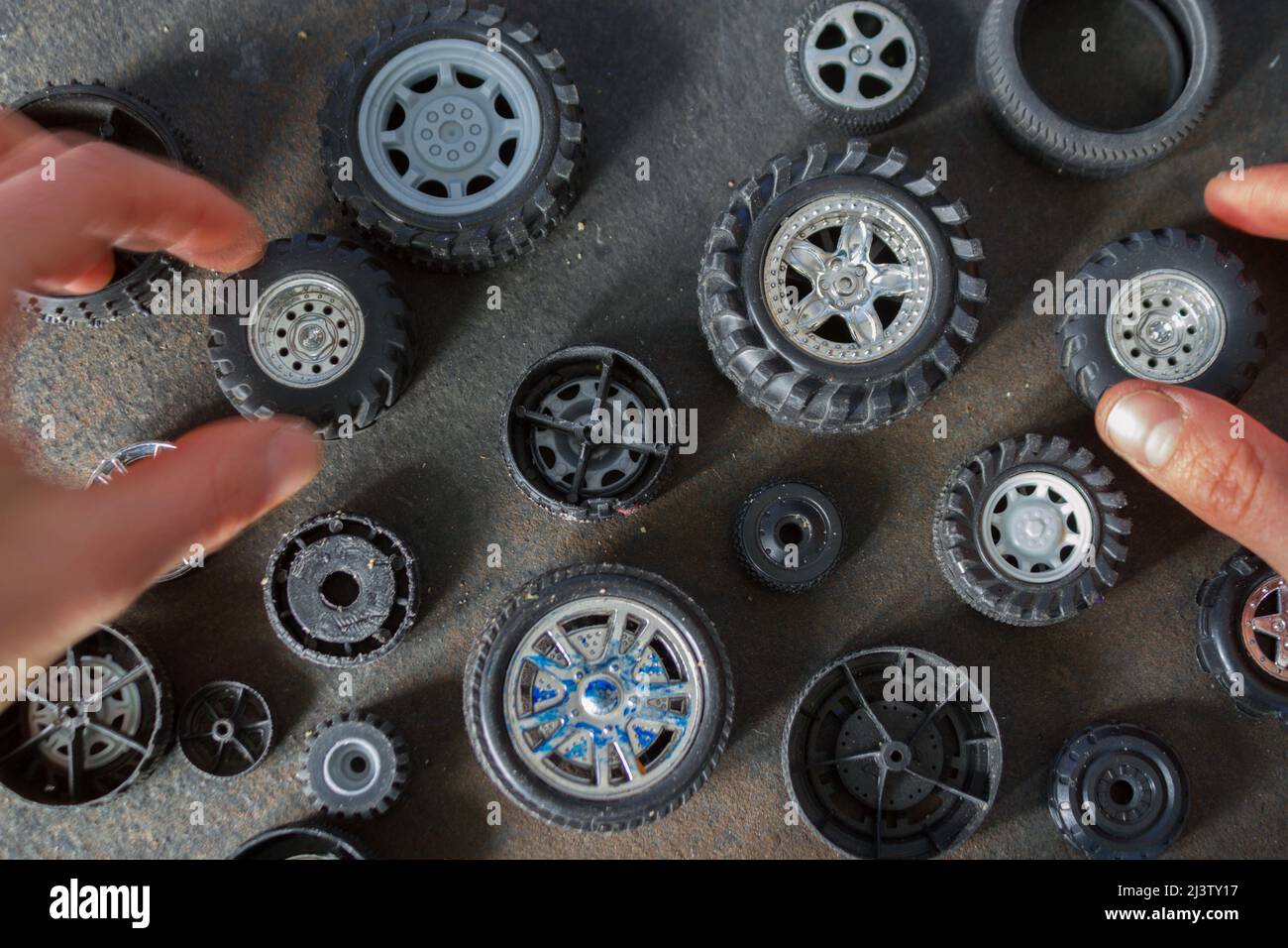 Different tyres and wheels background Stock Photo - Alamy