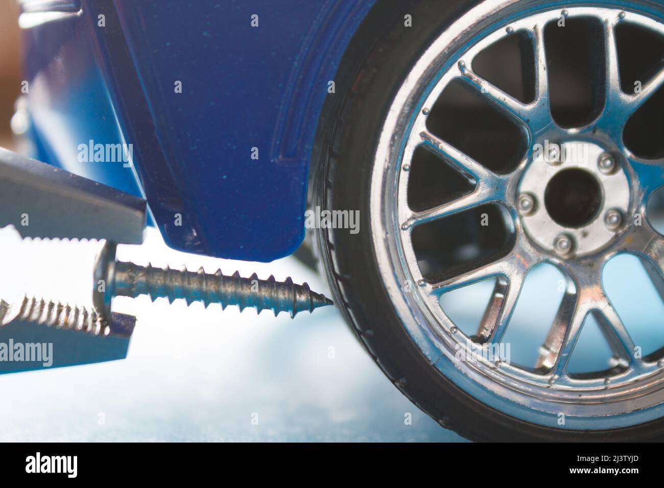 Repair a car concept. Stubbing wheels Stock Photo - Alamy