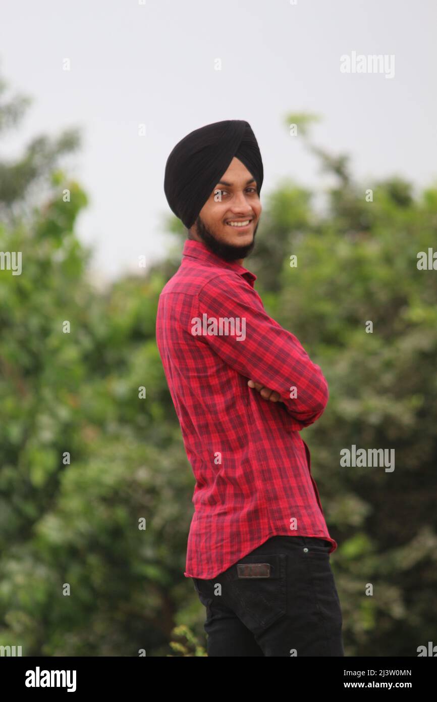 portrait of Young happy Indian sikh handsome man with smile, Mumbai ...
