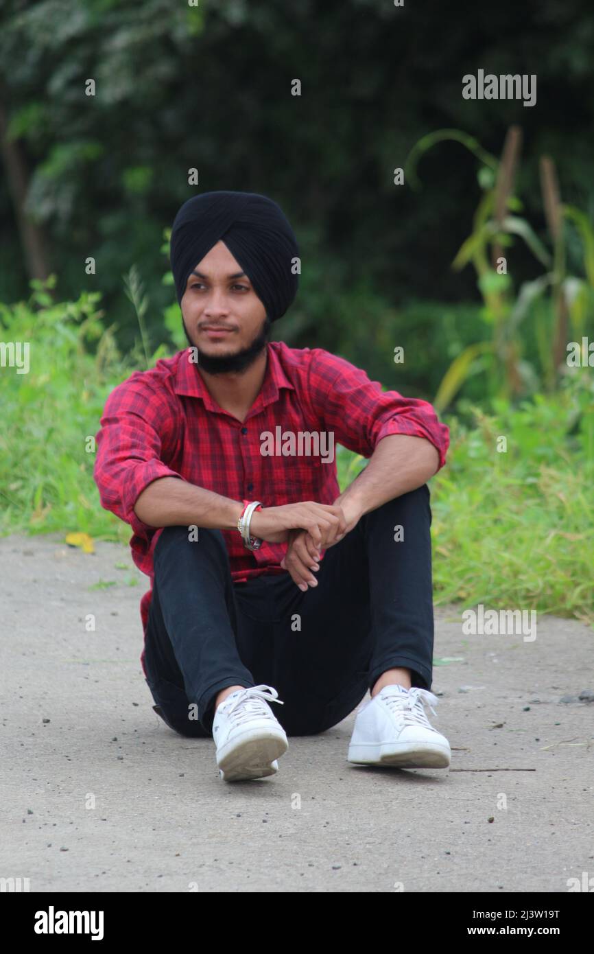 portrait of Young happy Indian sikh handsome man with smile, Mumbai ...