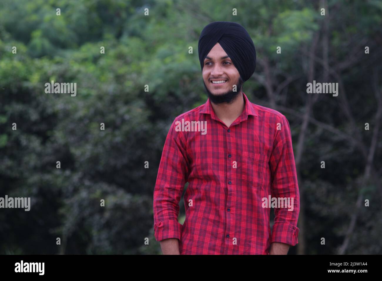 portrait of Young happy Indian sikh handsome man with smile, Mumbai ...