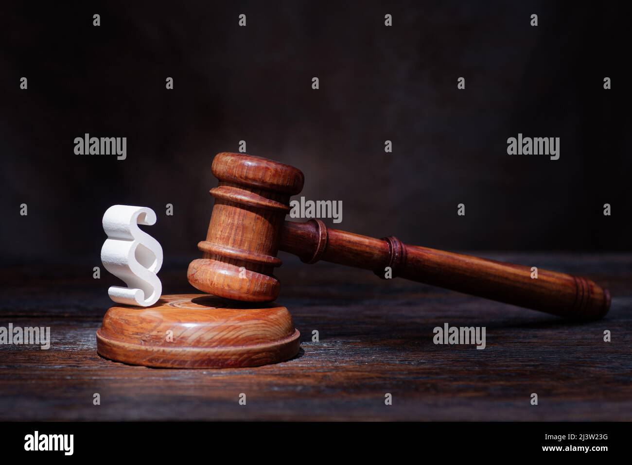Wooden judges gavel and symbol of law and justice on table in a ...