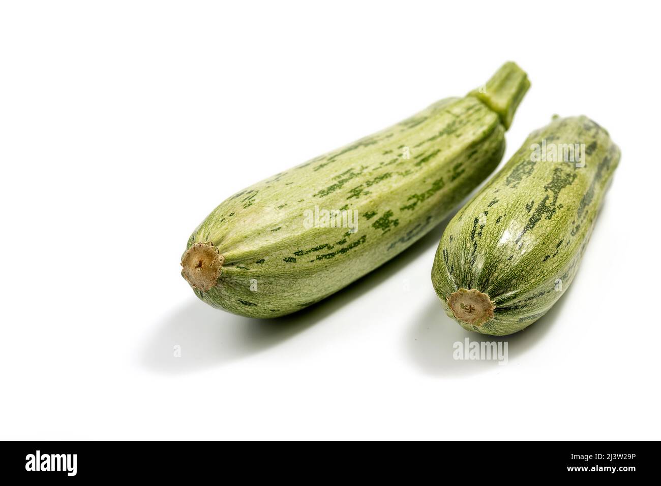 Fresh cut zucchini isolated on a white background with clipping path ...