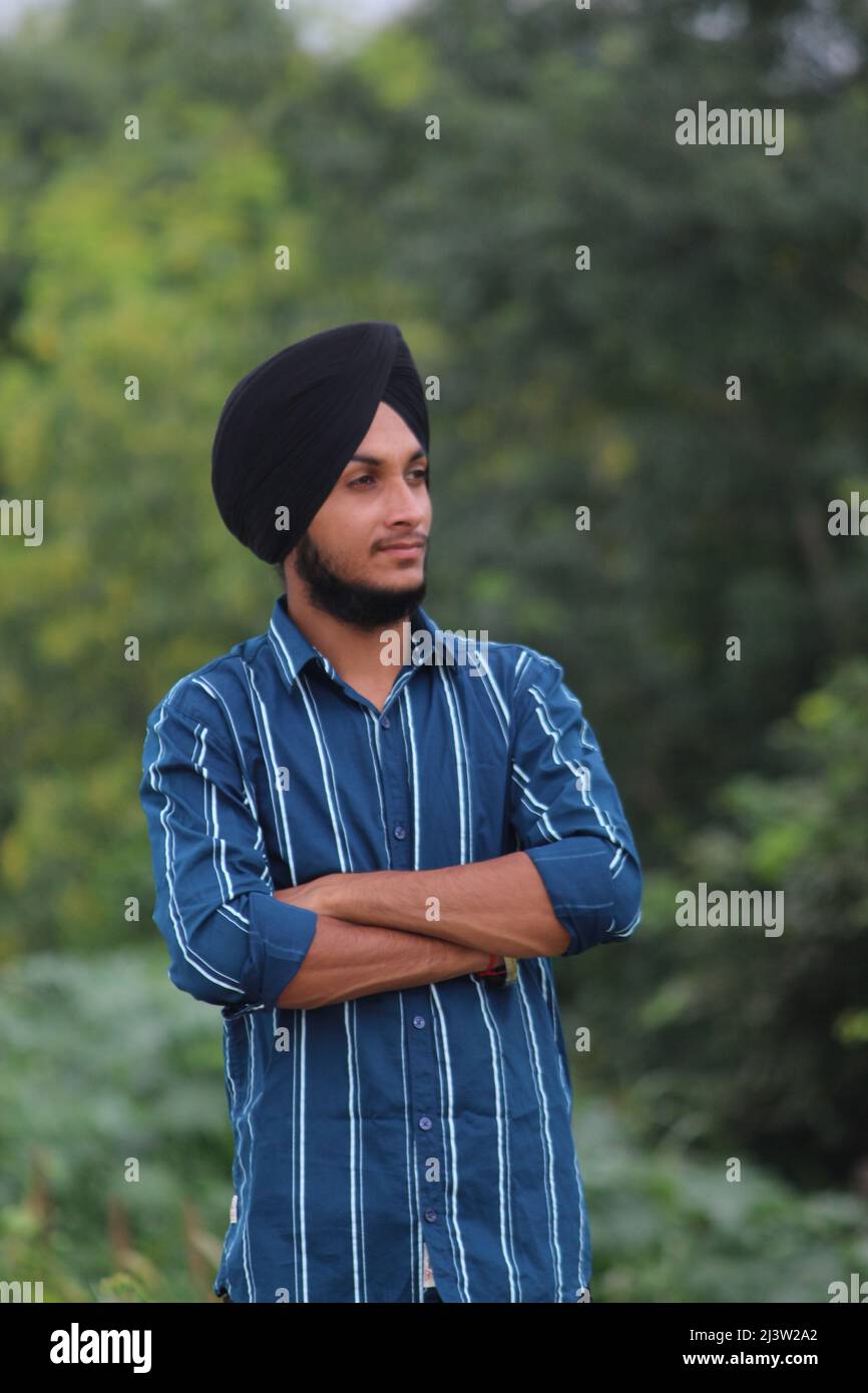 portrait of Young happy Indian sikh handsome man with smile, Mumbai ...