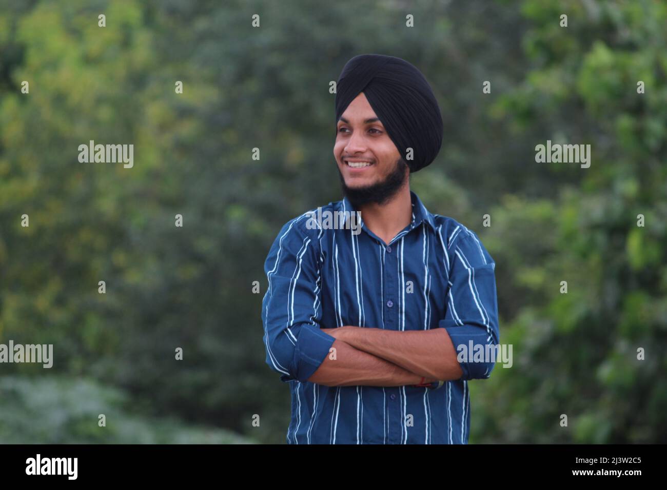 portrait of Young happy Indian sikh handsome man with smile, Mumbai ...