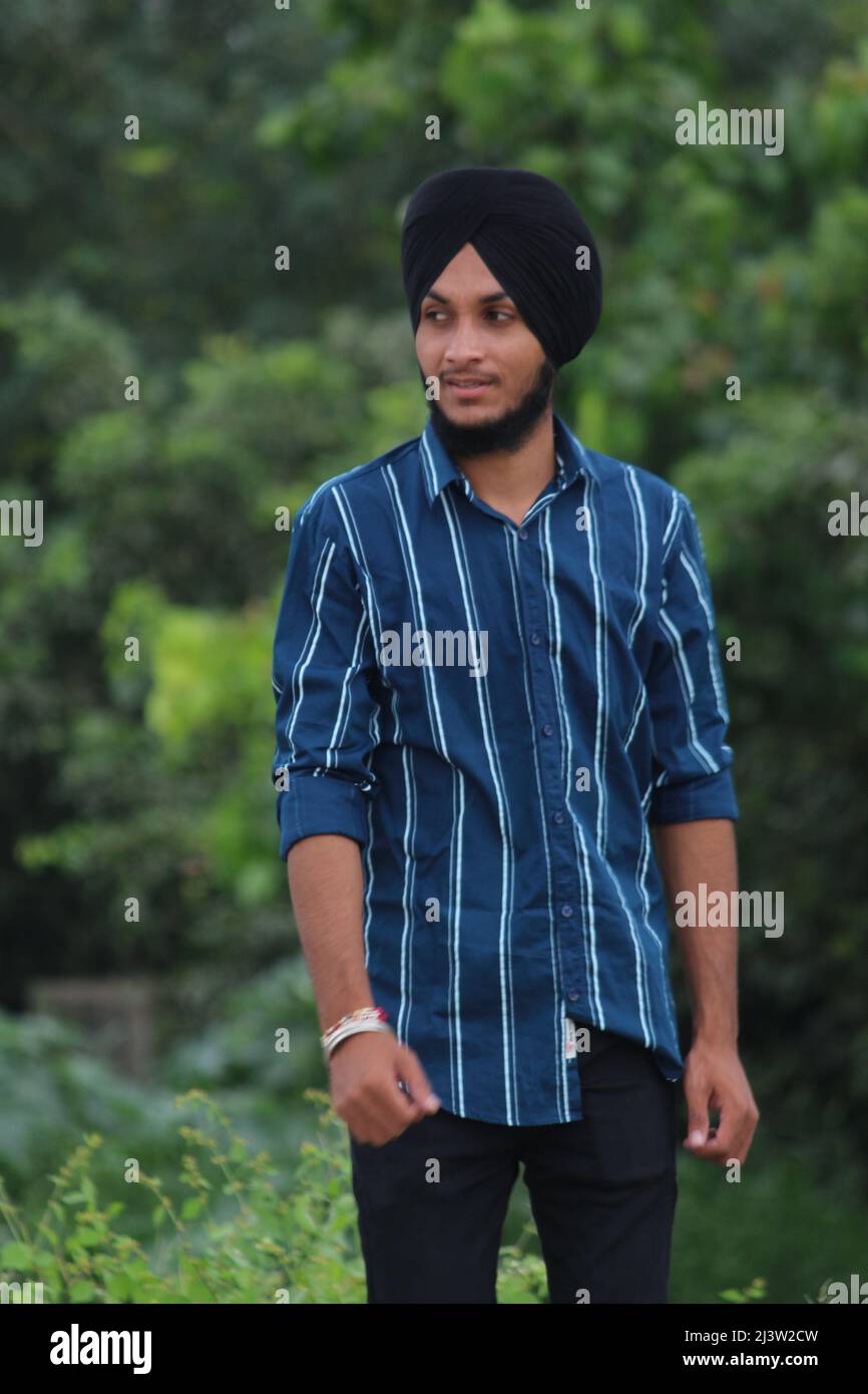 portrait of Young happy Indian sikh handsome man with smile, Mumbai ...