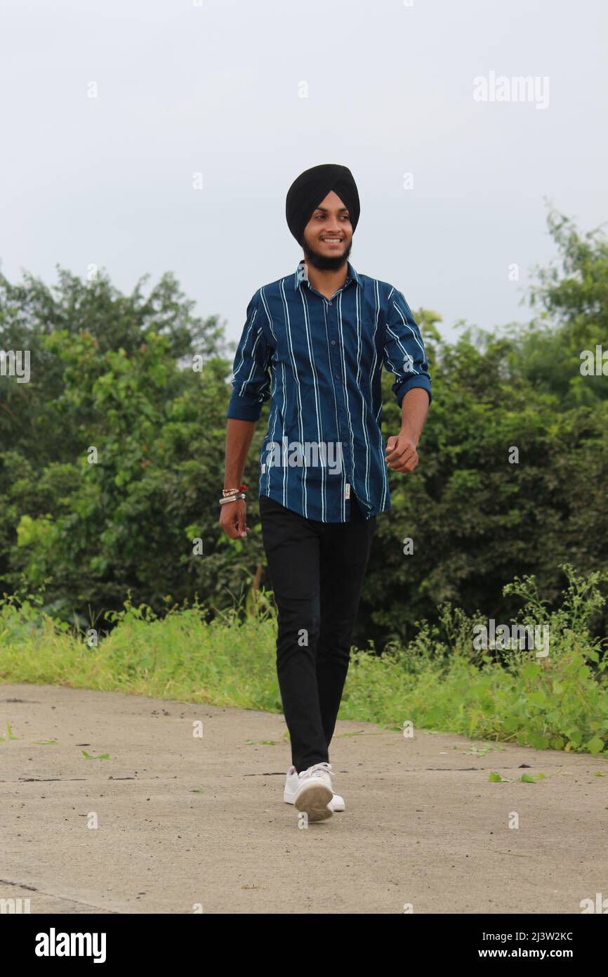 portrait of Young happy Indian sikh handsome man with smile, Mumbai ...