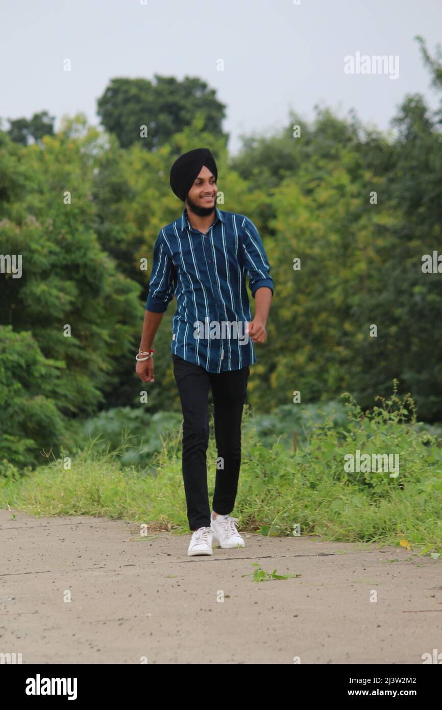 portrait of Young happy Indian sikh handsome man with smile, Mumbai ...