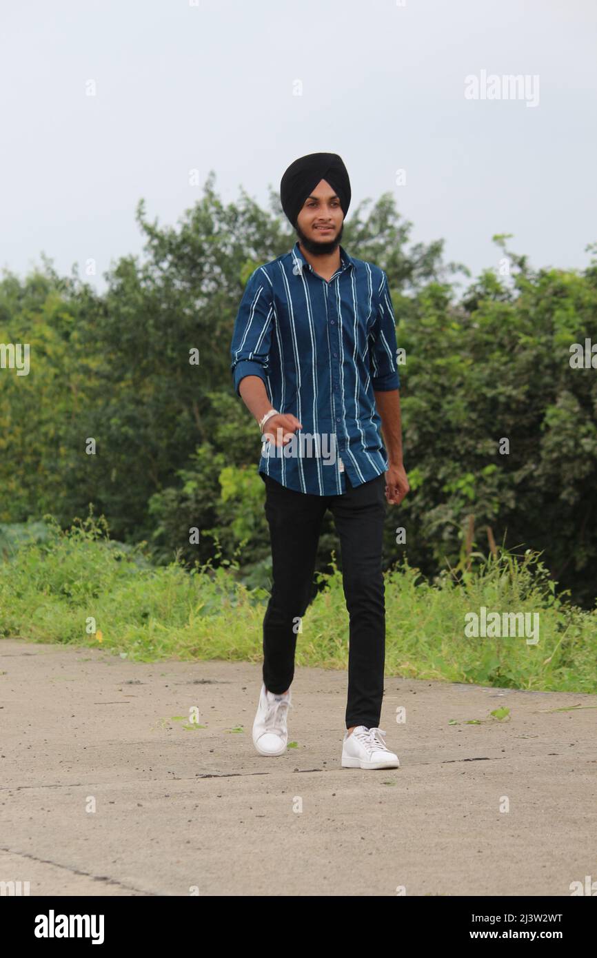 portrait of Young happy Indian sikh handsome man with smile, Mumbai ...