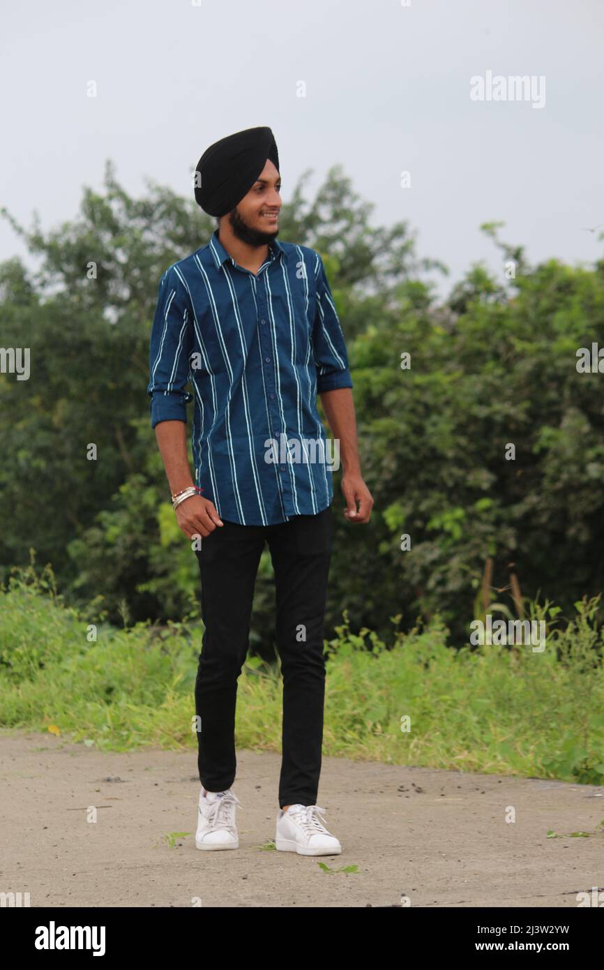 portrait of Young happy Indian sikh handsome man with smile, Mumbai ...
