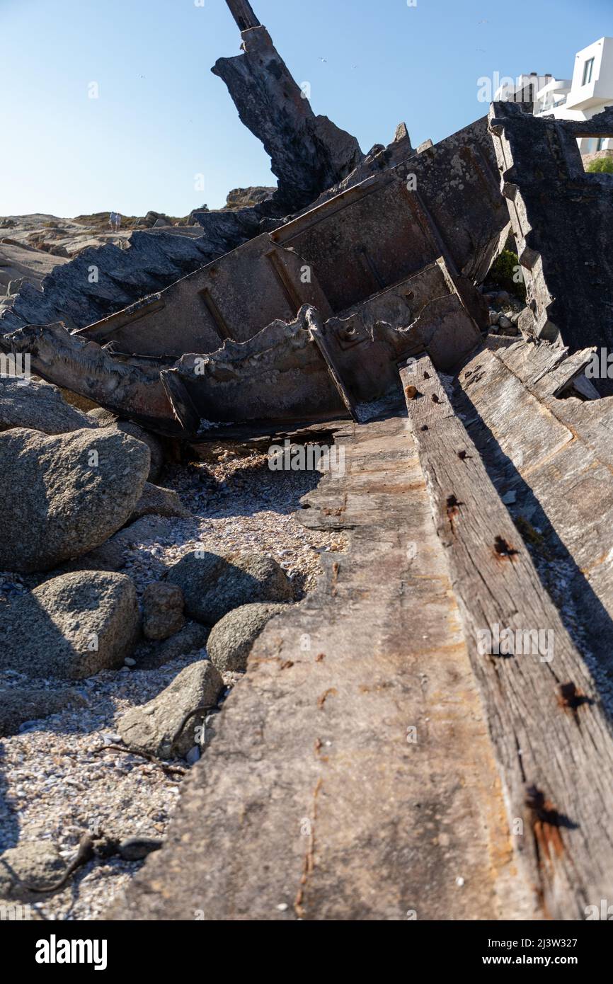 Selective focus on the disintegrating fibreglass part of the hull of an ...