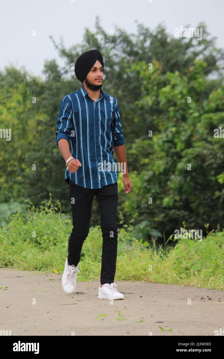 portrait of Young happy Indian sikh handsome man with smile, Mumbai ...
