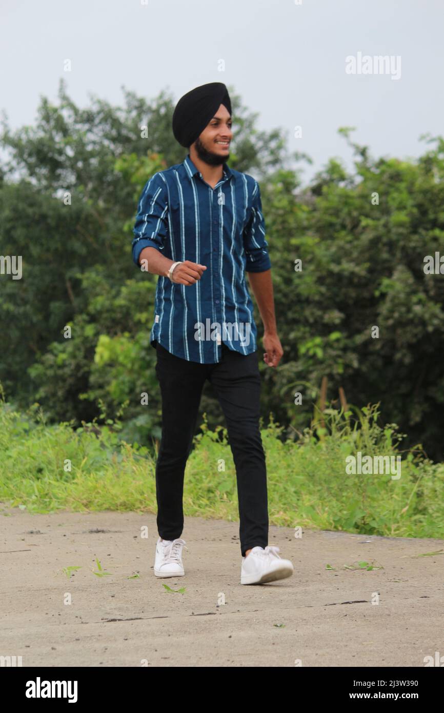 portrait of Young happy Indian sikh handsome man with smile, Mumbai ...