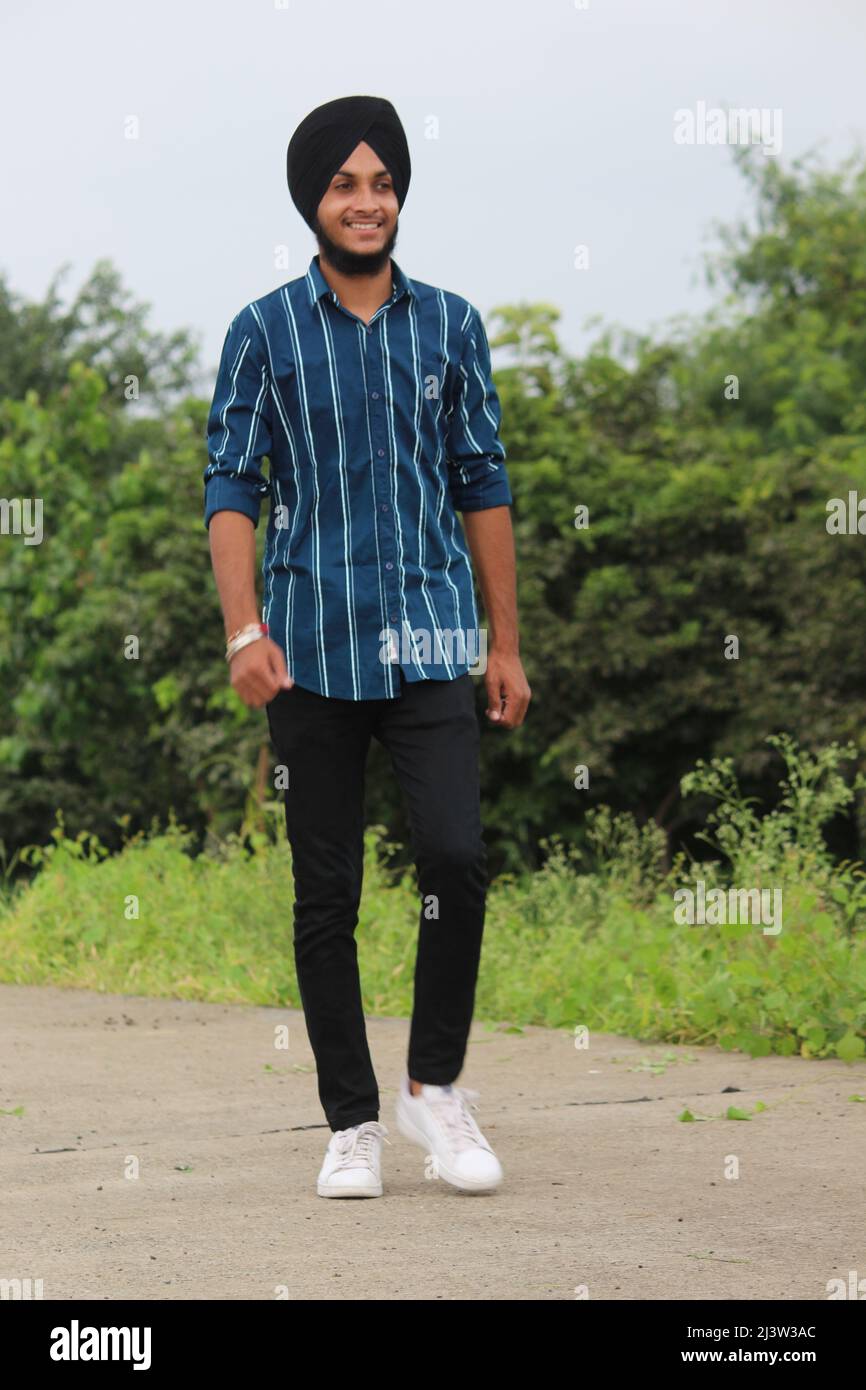 portrait of Young happy Indian sikh handsome man with smile, Mumbai ...