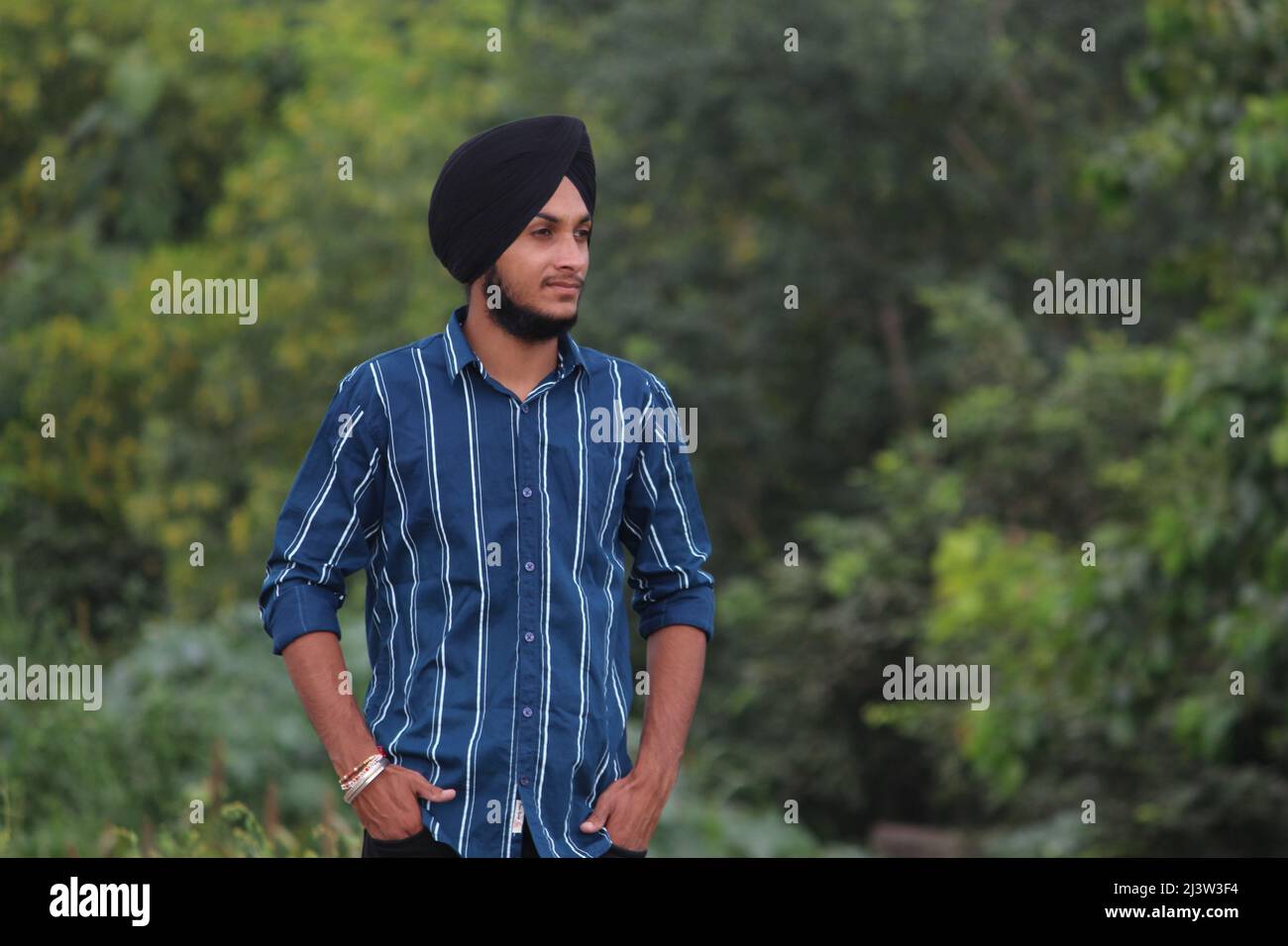 portrait of Young happy Indian sikh handsome man with smile, Mumbai ...