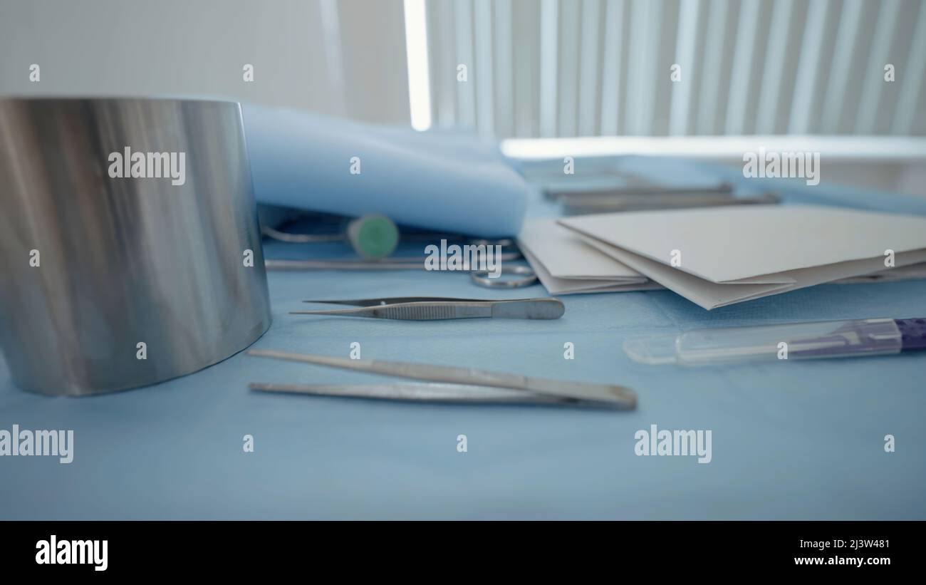 Surgical instruments and tools in the operating room. Action. Close up ...