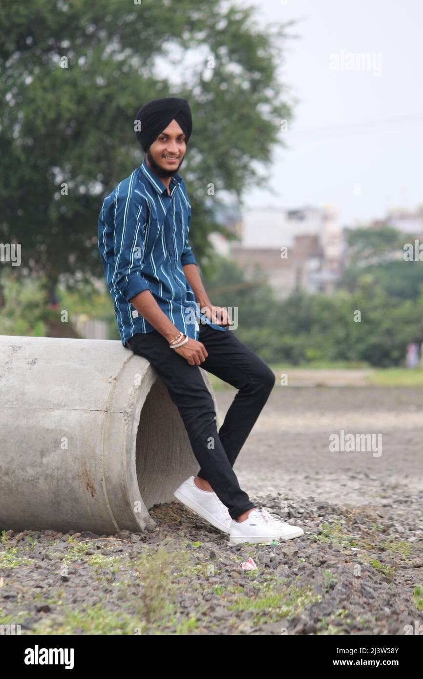 portrait of Young happy Indian sikh handsome man with smile, Mumbai ...