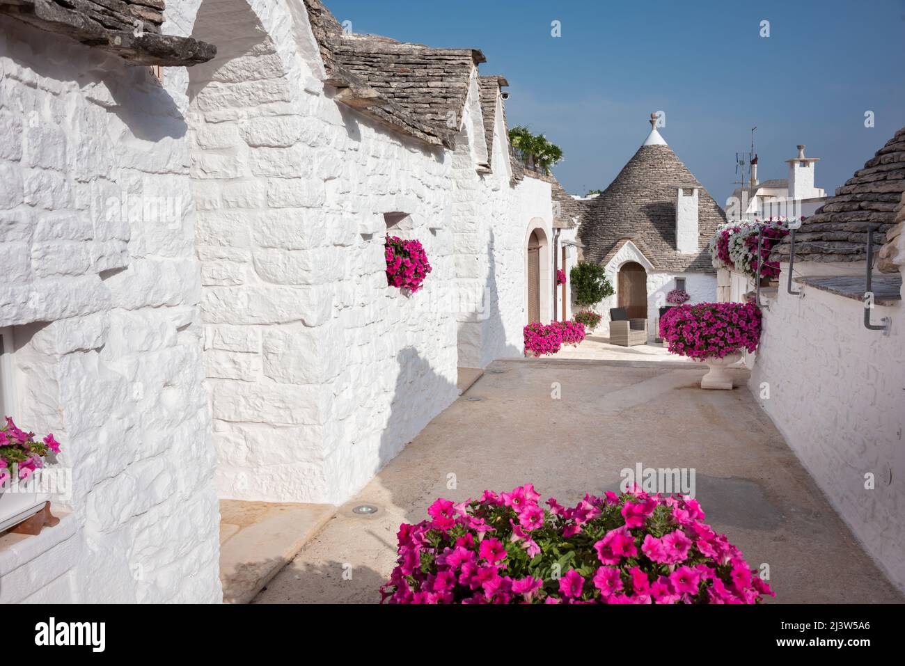 Alberobello town in Italy, famous for its traditional trullo houses ...
