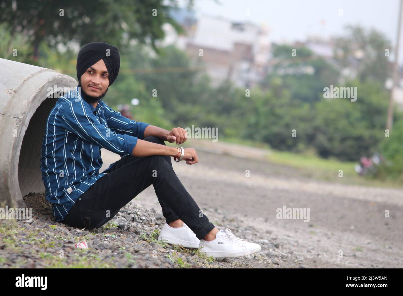 portrait of Young happy Indian sikh handsome man with smile, Mumbai ...