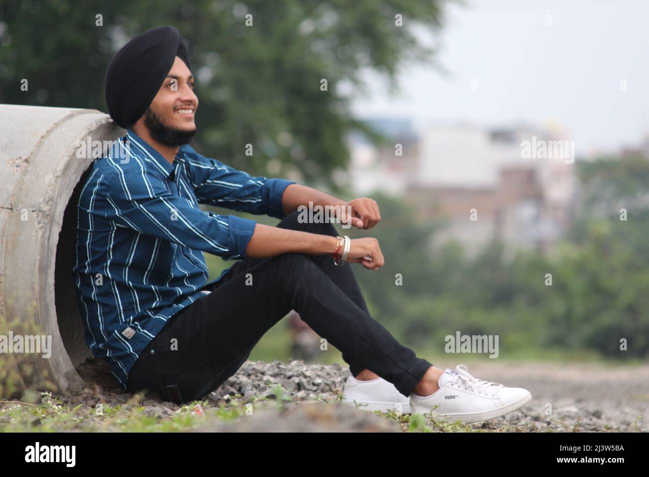 portrait of Young happy Indian sikh handsome man with smile, Mumbai ...