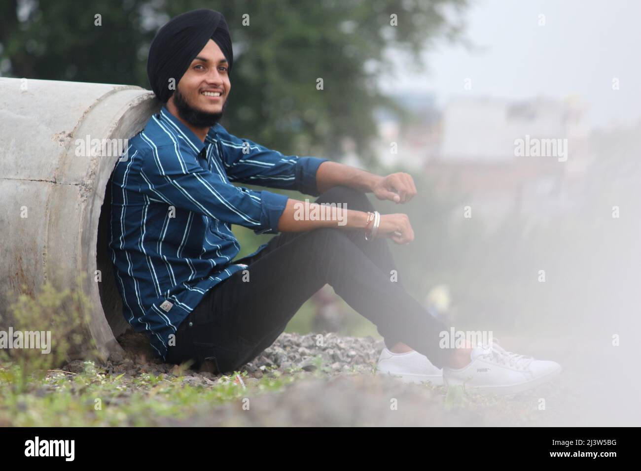 portrait of Young happy Indian sikh handsome man with smile, Mumbai ...