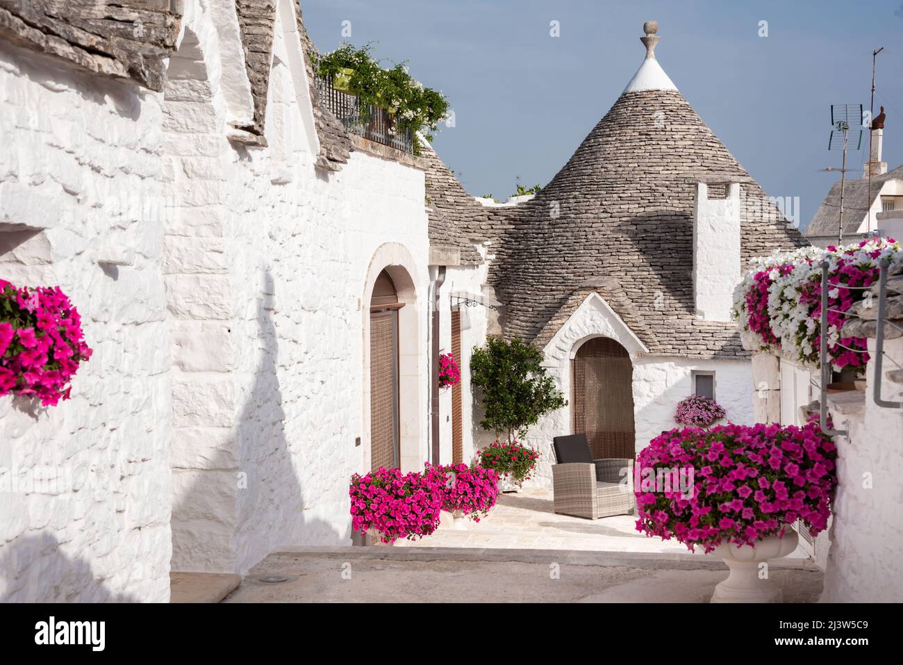 Alberobello town in Italy, famous for its traditional trullo houses ...