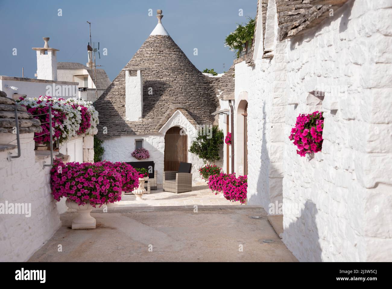 Alberobello town in Italy, famous for its traditional trullo houses ...