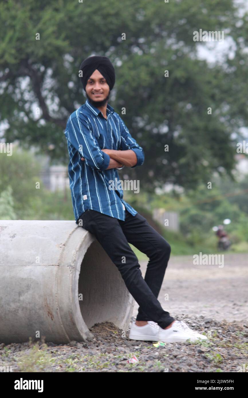 portrait of Young happy Indian sikh handsome man with smile, Mumbai ...