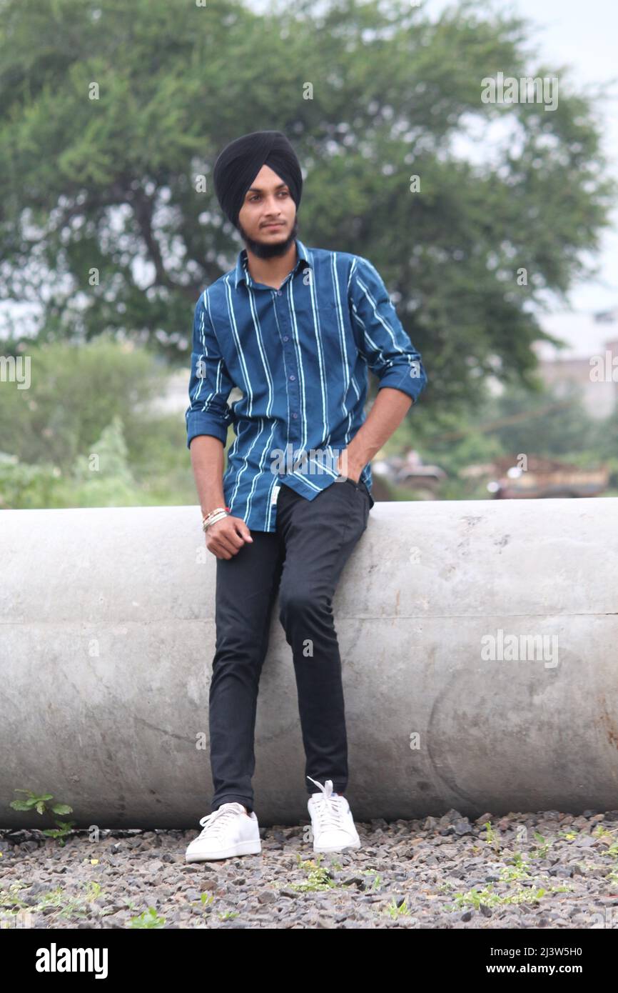 portrait of Young happy Indian sikh handsome man with smile, Mumbai ...