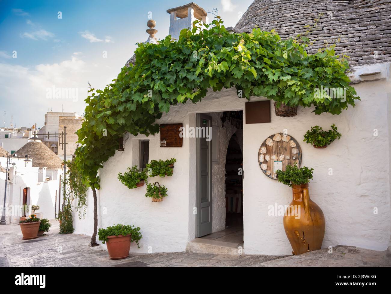 Alberobello town in Italy, famous for its traditional trullo houses ...