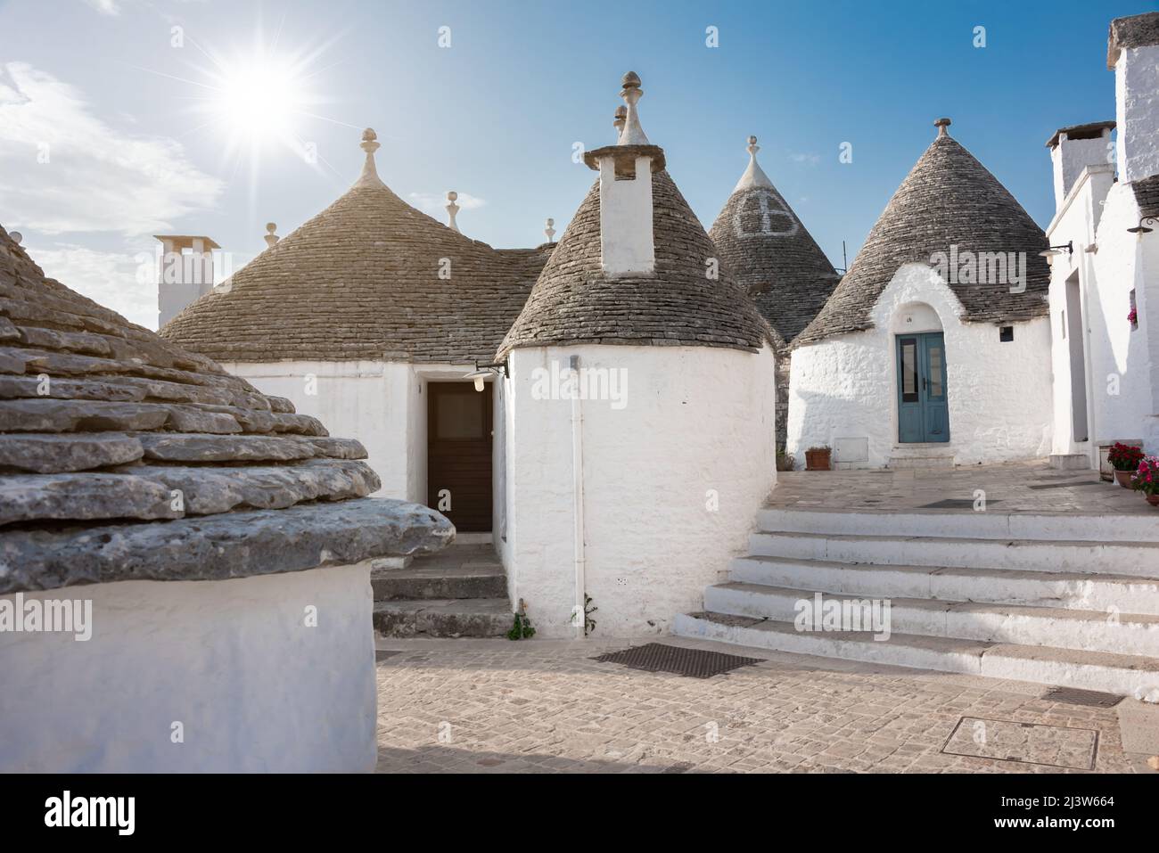 Alberobello town in Italy, famous for its traditional trullo houses ...