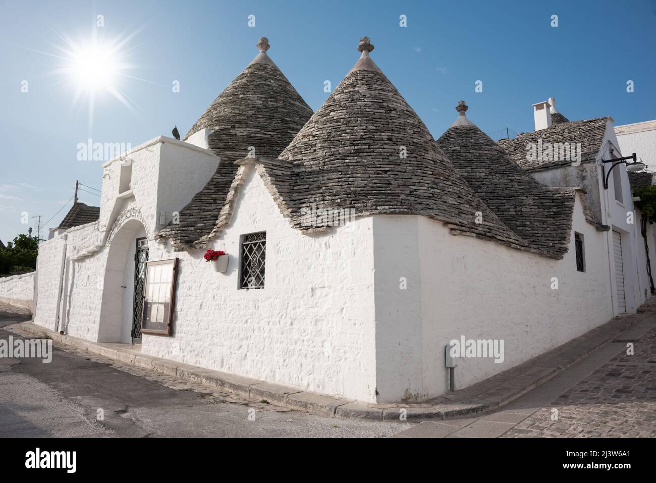 Alberobello town in Italy, famous for its traditional trullo houses ...