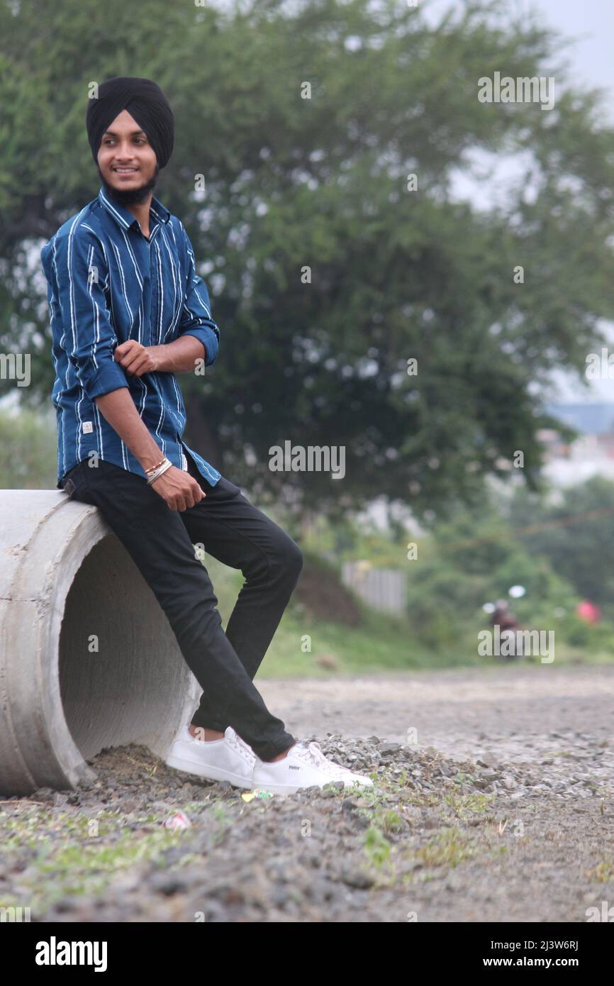 portrait of Young happy Indian sikh handsome man with smile, Mumbai ...
