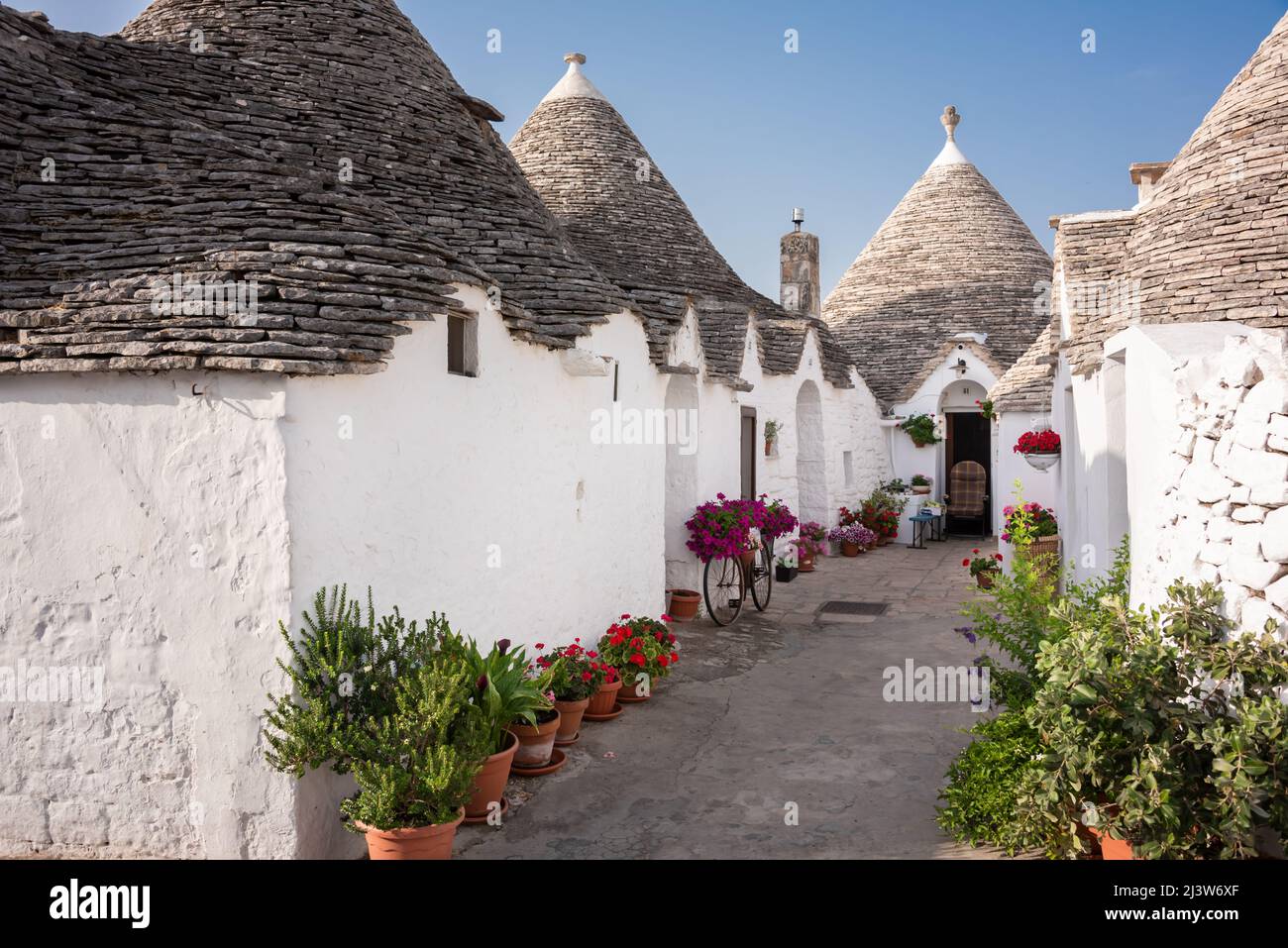 Alberobello town in Italy, famous for its traditional trullo houses ...