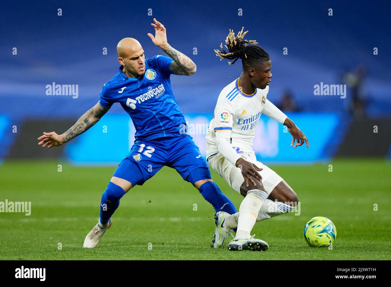 Sandro Ramirez of Getafe CF and Eduardo Camavinga of Real Madrid during ...