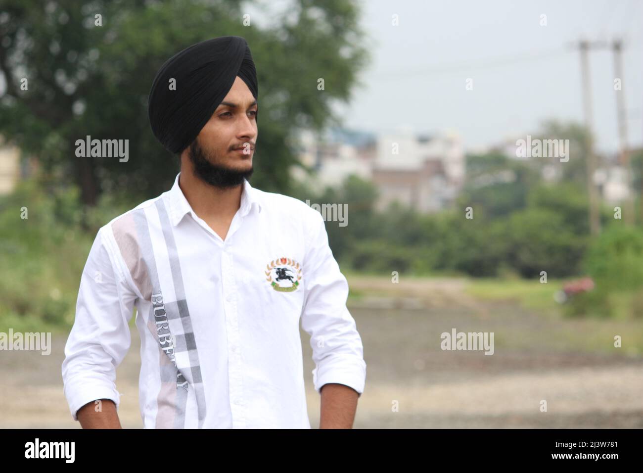 portrait of Young happy Indian sikh handsome man with smile, Mumbai ...