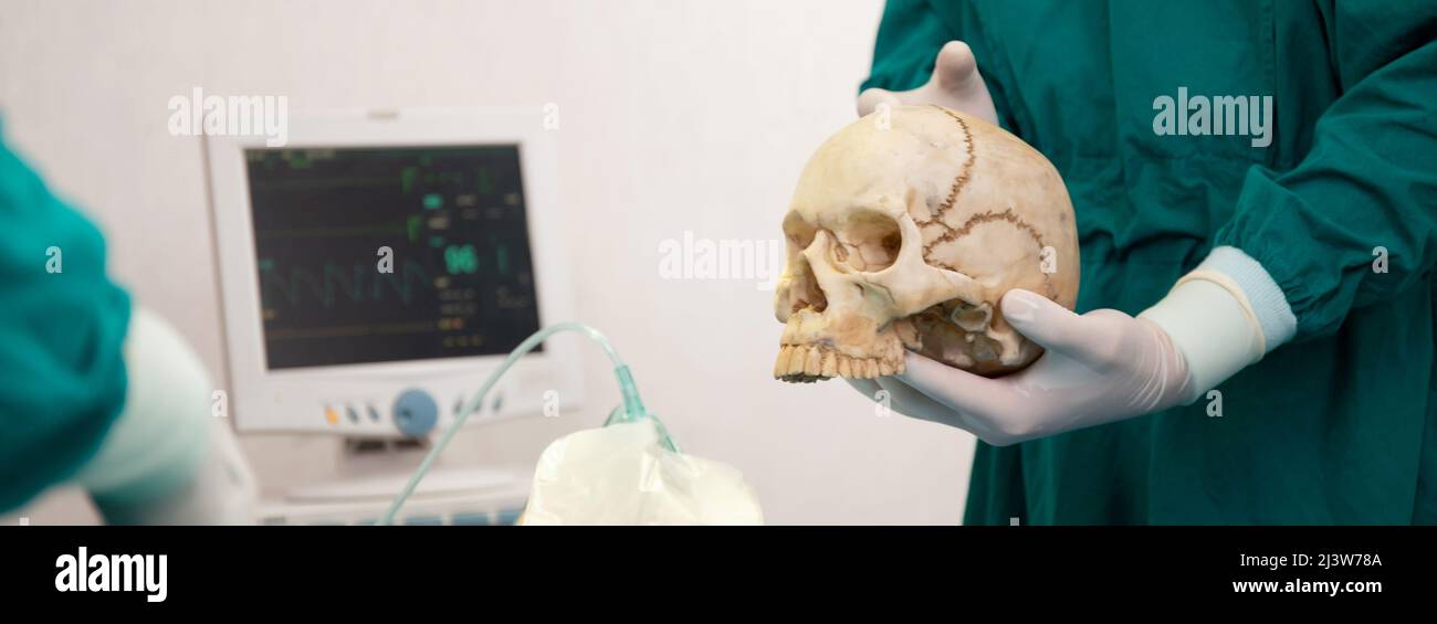 Team of doctor and surgeon explain about surgery skull and brain with ...