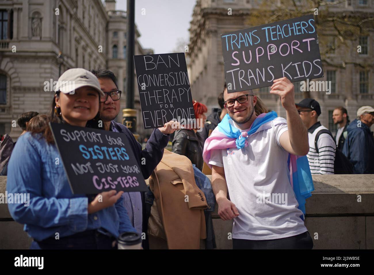 People take part in a protest outside Downing Street in London, over ...