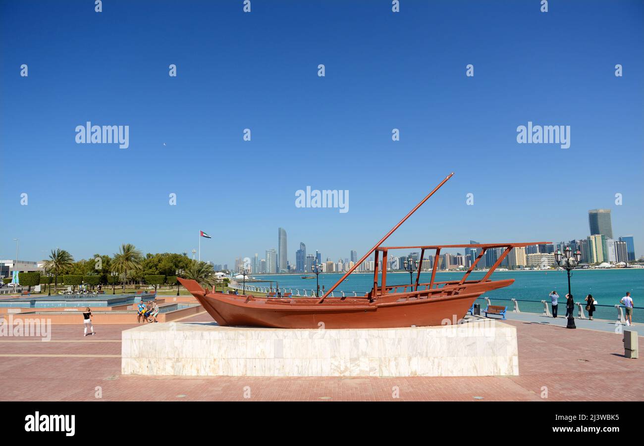Traditional wooden Dhow boat displayed at the Marina of Abu Dhabi, UAE ...
