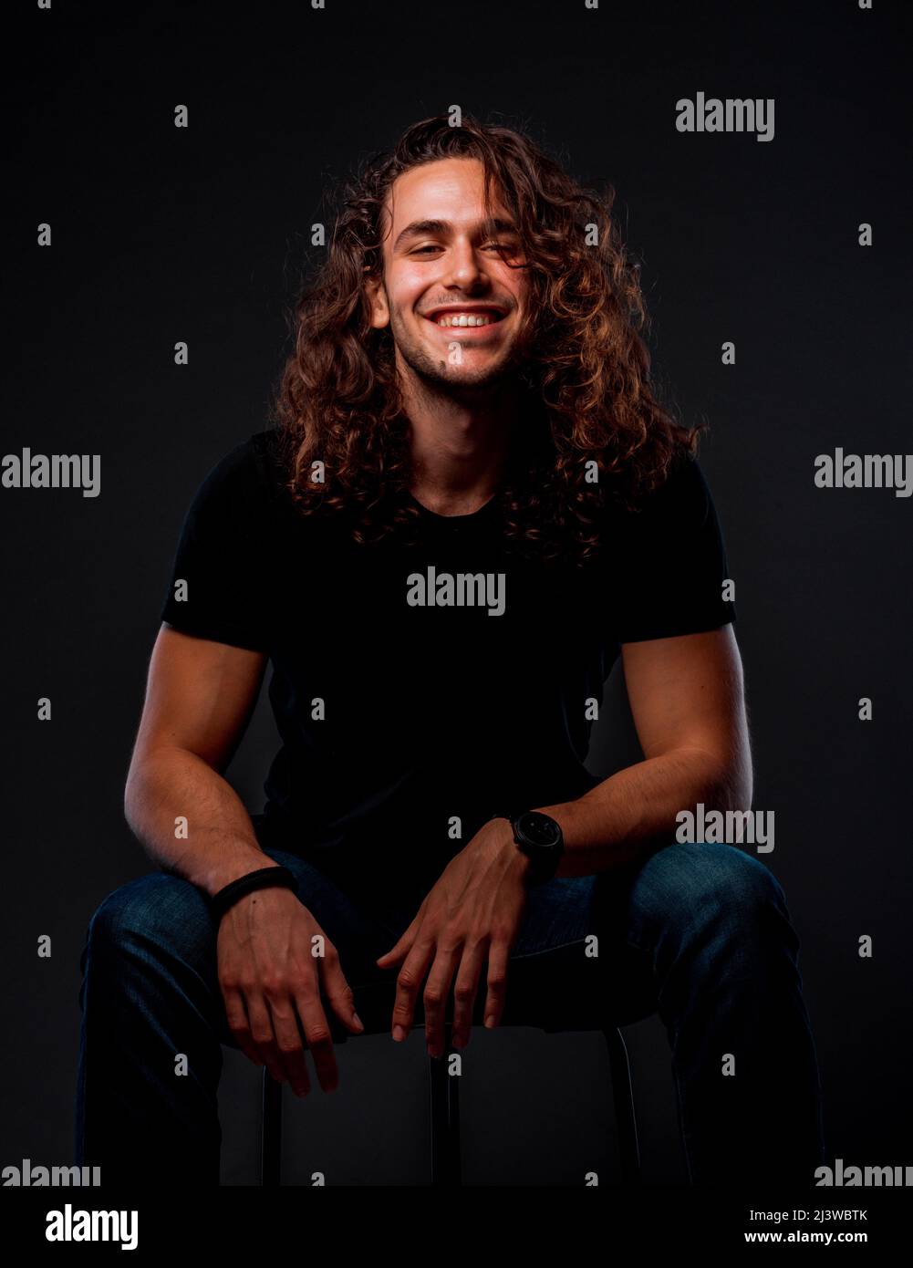 Portrait of a handsome male model posing in cool fashionable clothing ...