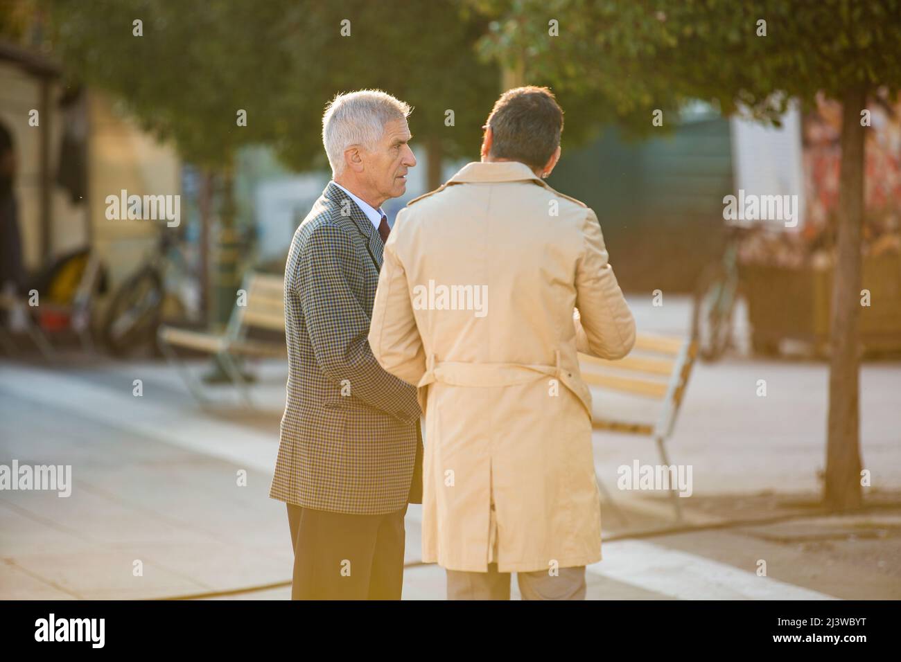Two seniors businessmen are having a conversation, outside Stock Photo ...