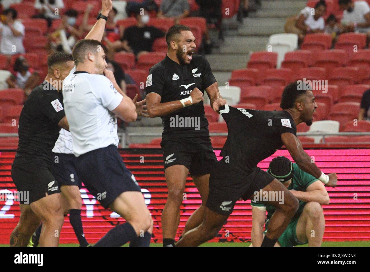 Singapore. 10th Apr, 2022. Akuila Rokolisoa (R) of New Zealand ...
