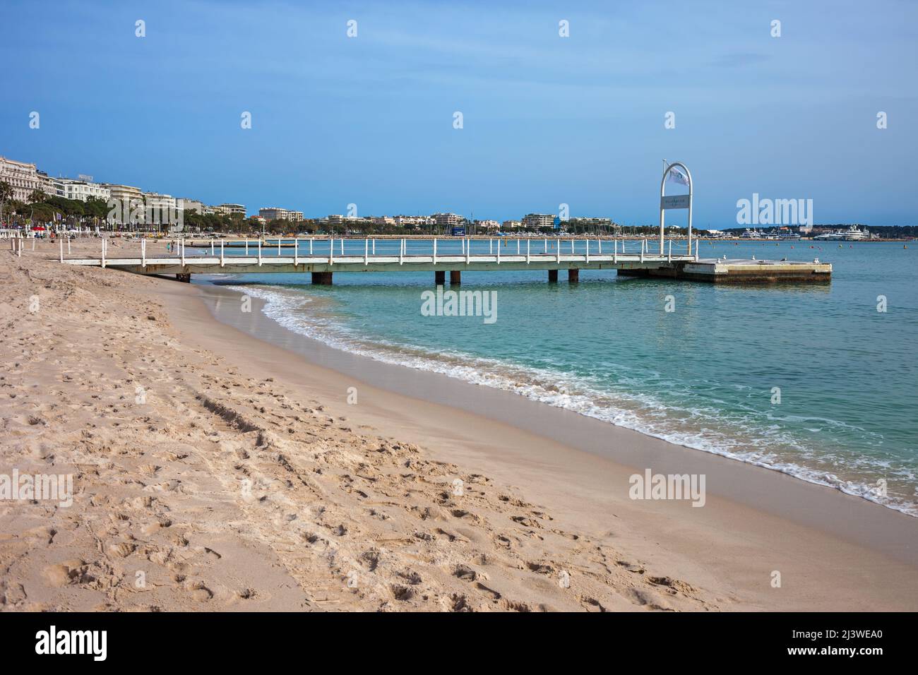 City of Cannes, France, sandy beach and sea pier on French Riviera ...