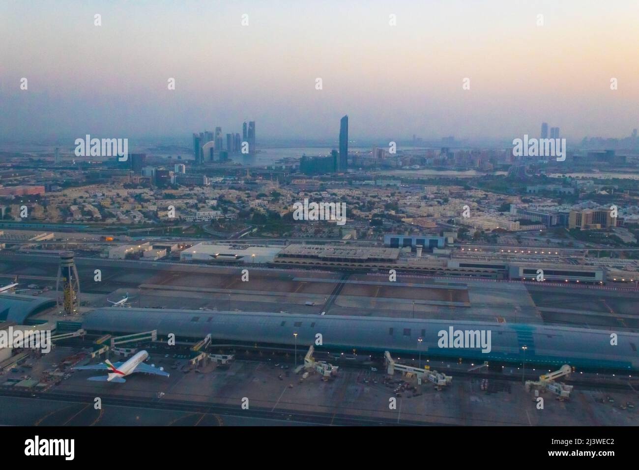 Evening view of Dubai Skyline under dark night sky seen from landing ...