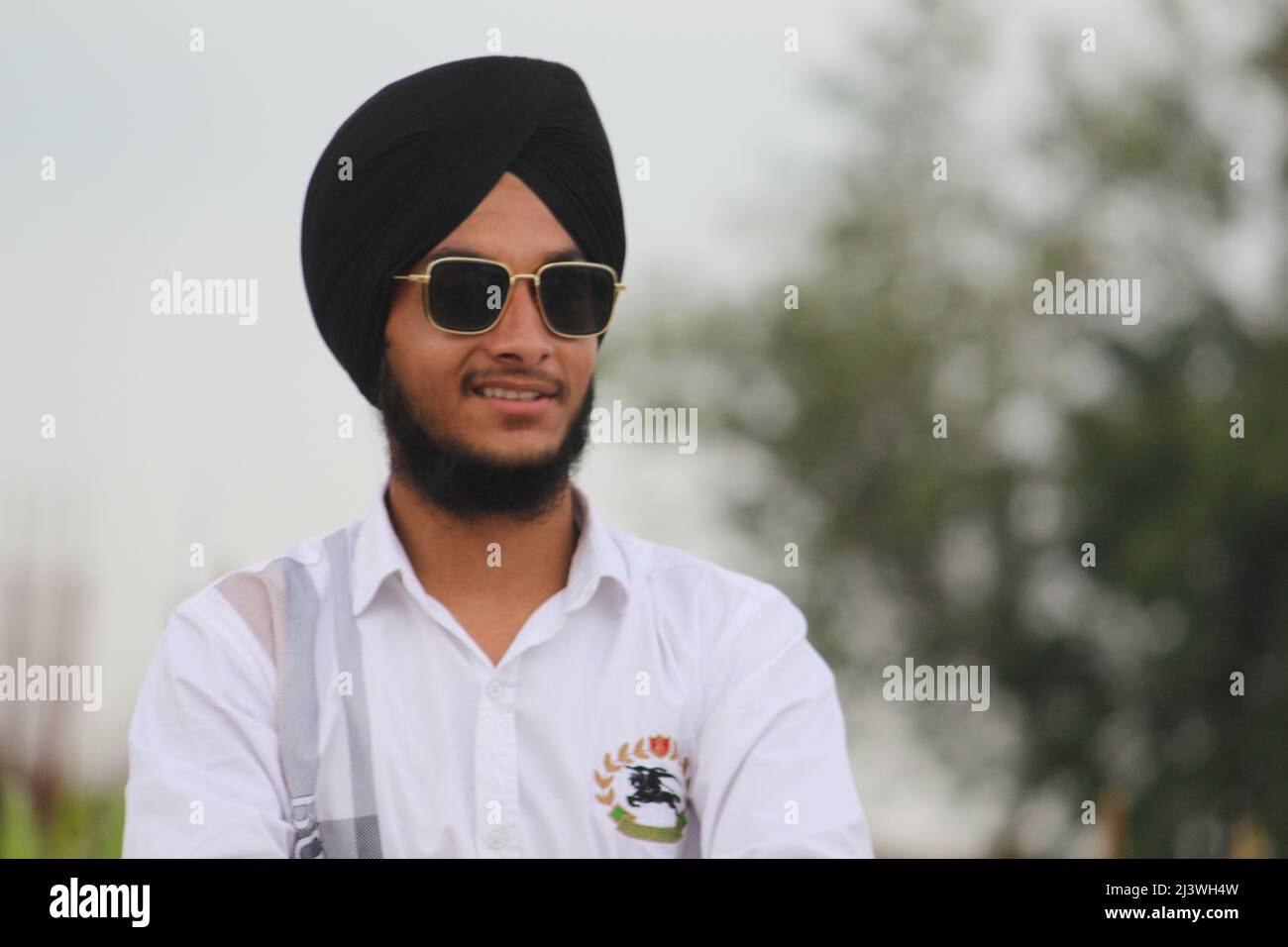 portrait of Young happy Indian sikh handsome man with smile, Mumbai ...