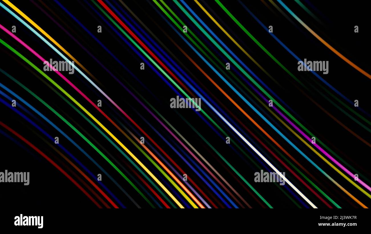 Rainbow diagonal lines shimmer on black background. Motion. Beautiful ...