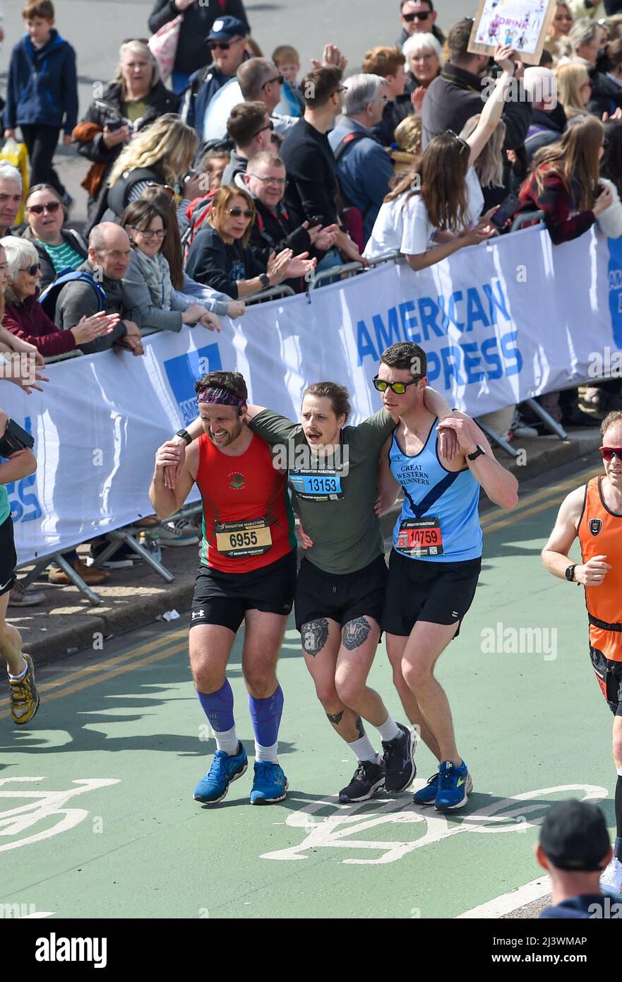 Helping exhausted runner finish hi-res stock photography and images - Alamy