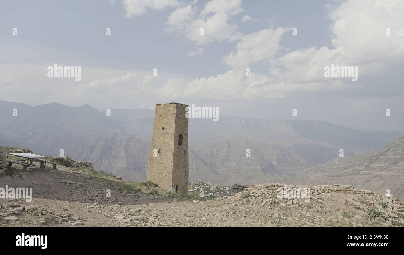 Mountain landscape with stone towers. Action. Stone fortress towers in ...