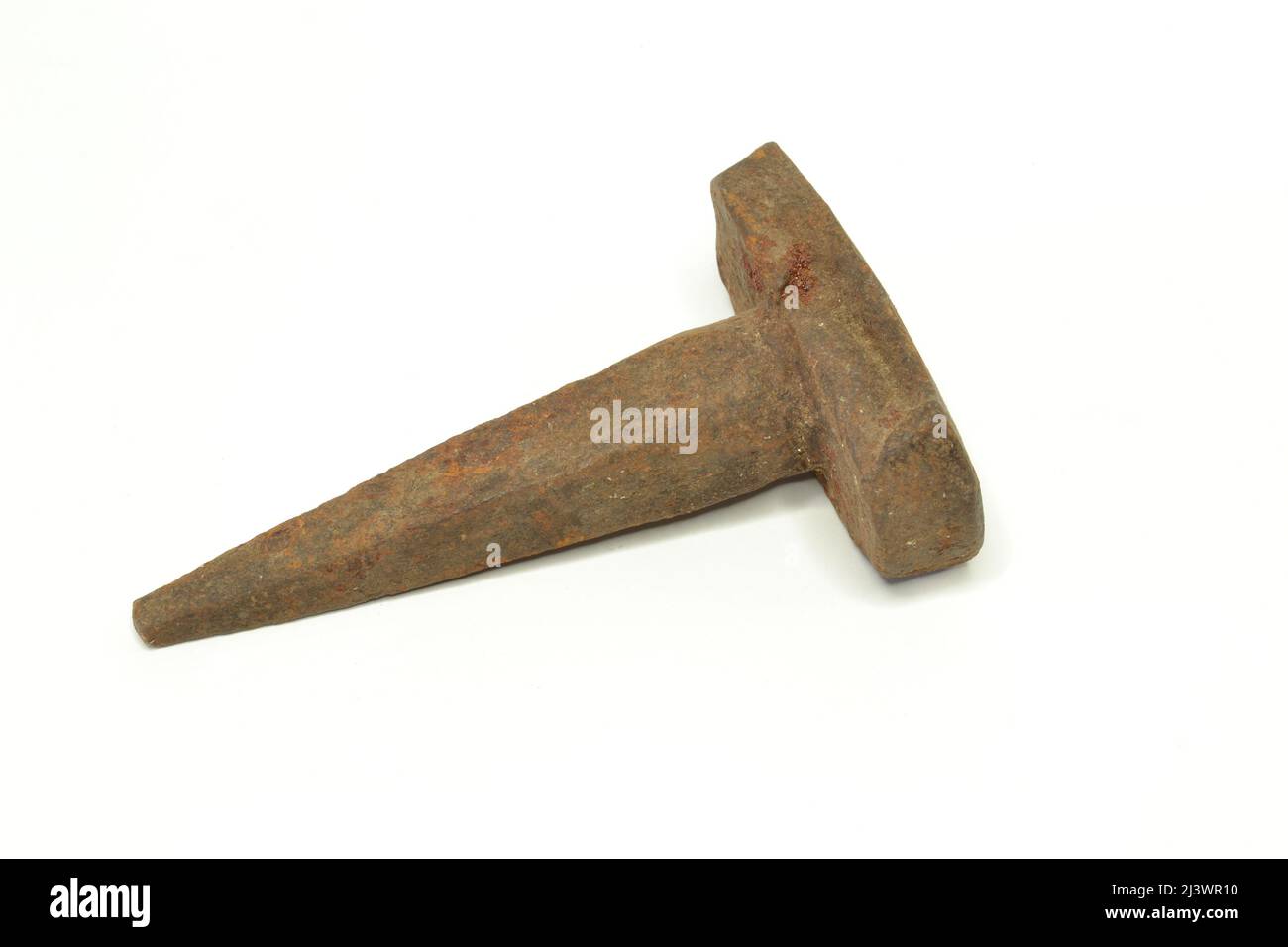 Old and rusty metal wedge on white background Stock Photo - Alamy