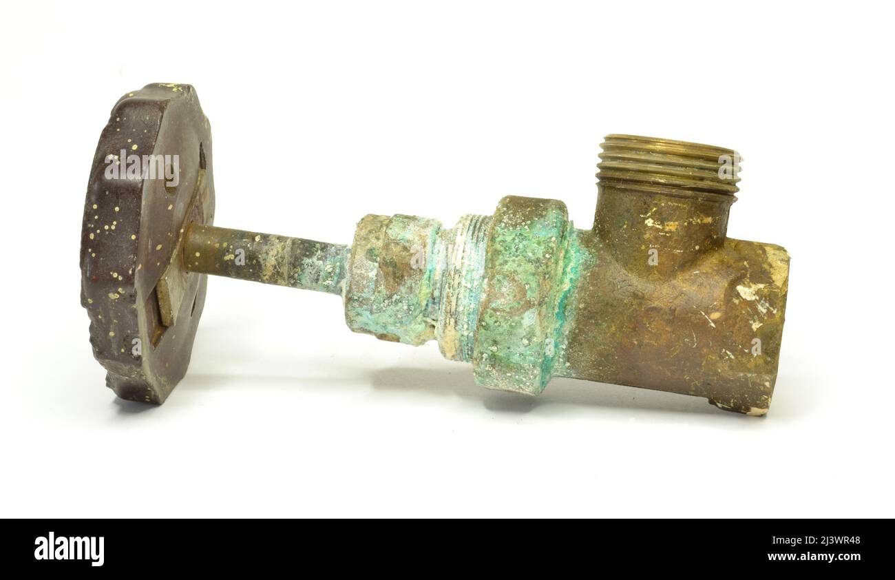 Vintage water ball valve on white background Stock Photo - Alamy